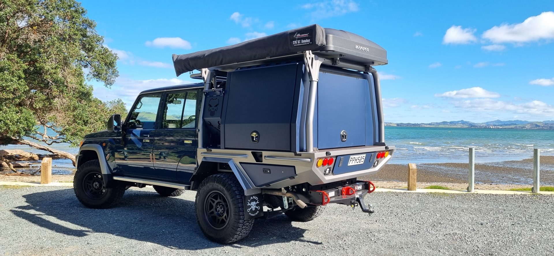 Blue Dbl Cab removable camper setup - Land Pirates